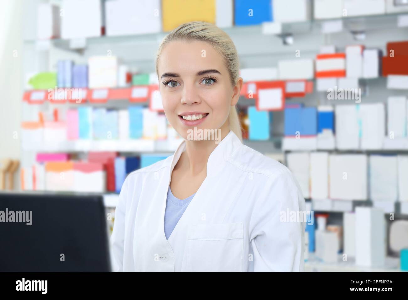 Female shop assistant at work Stock Photo - Alamy