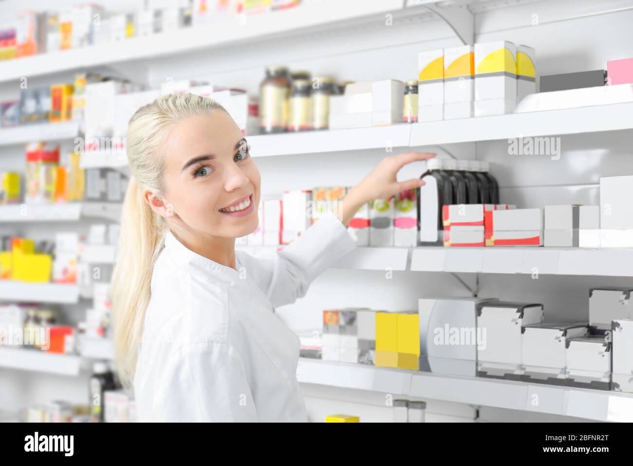 Female shop assistant at work Stock Photo - Alamy