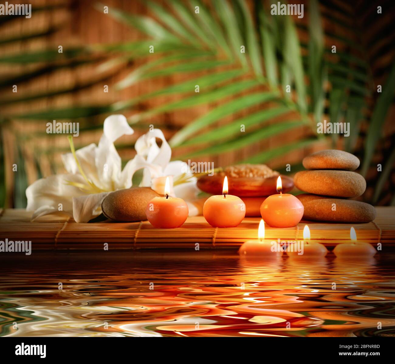 Beautiful spa composition with reflection on water surface Stock Photo ...