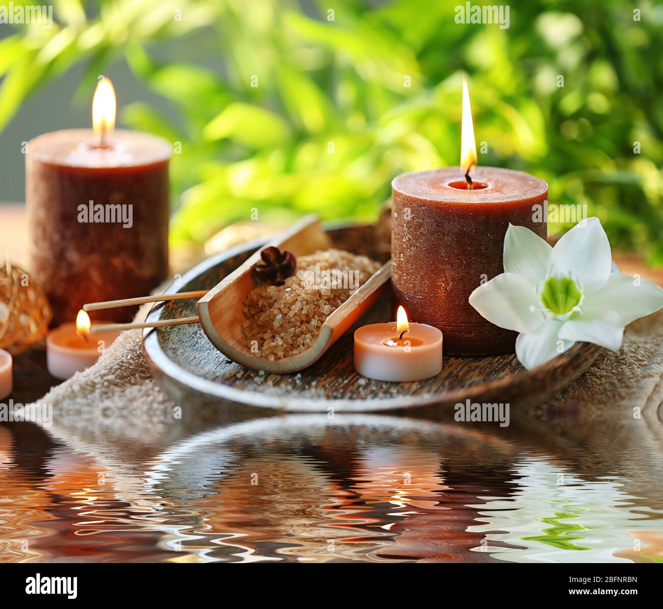Beautiful spa composition with reflection on water surface Stock Photo ...