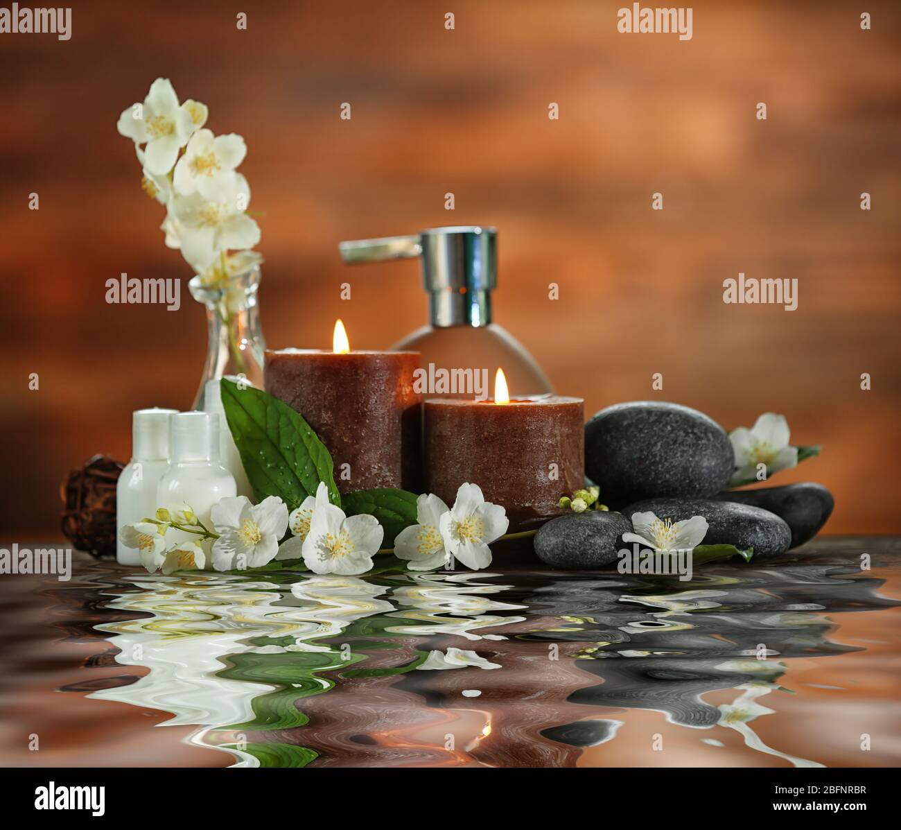 Beautiful spa composition with reflection on water surface Stock Photo ...
