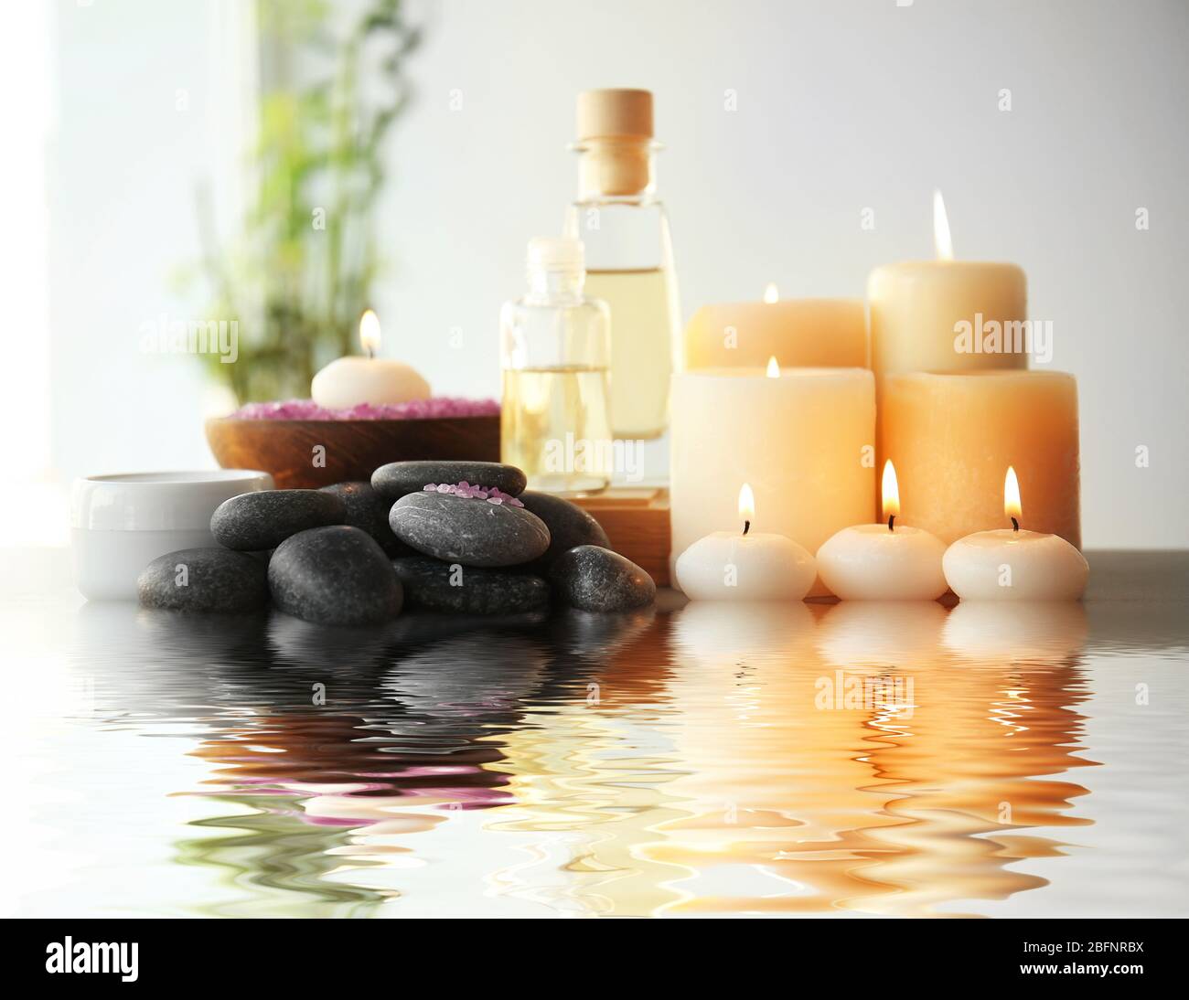 Beautiful spa composition with reflection on water surface Stock Photo ...