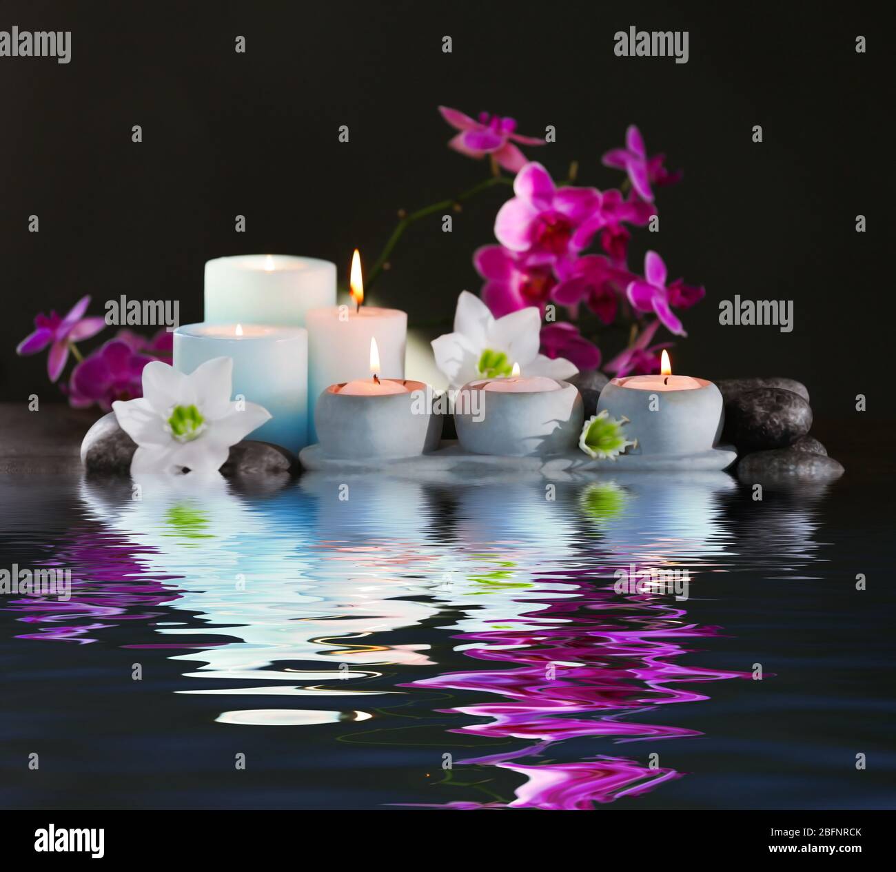 Beautiful spa composition with reflection on water surface Stock Photo ...