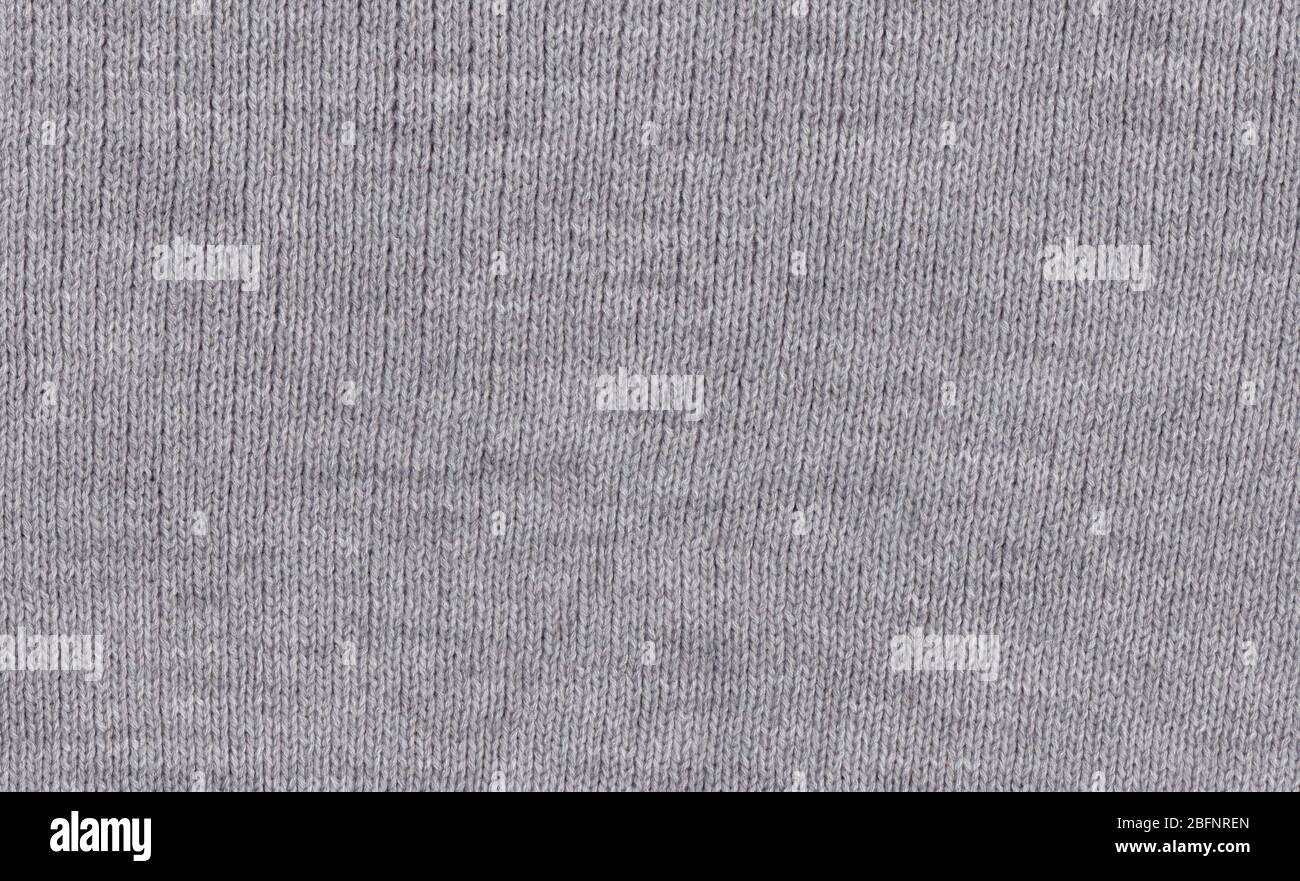 Knitted gray wallpaper and an abstract background Stock Photo - Alamy
