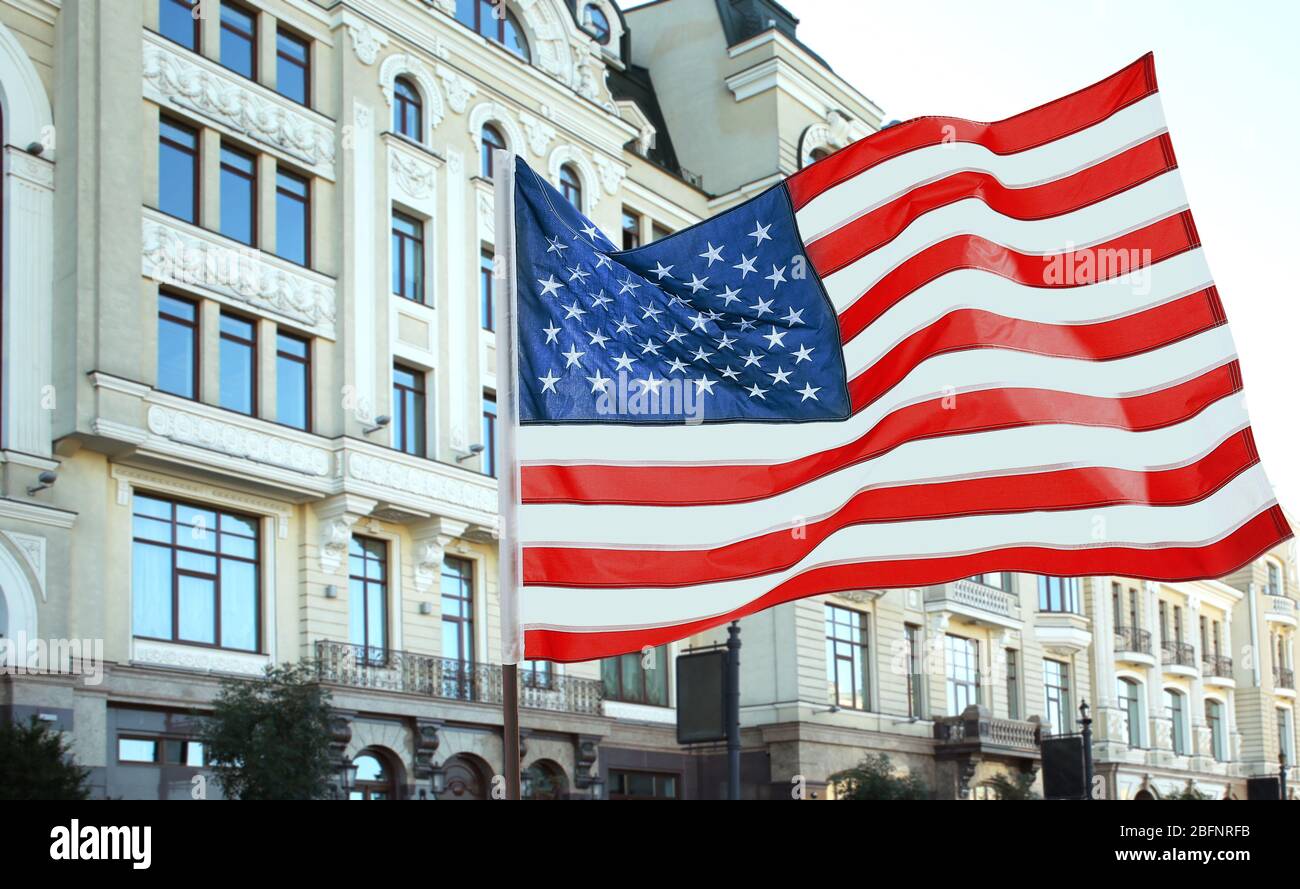 American flag on building background Stock Photo - Alamy
