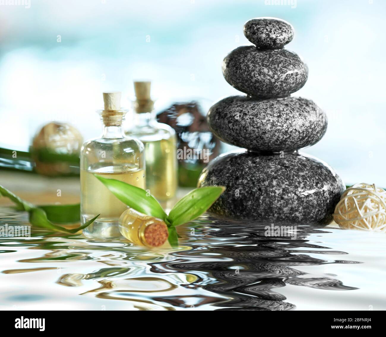 Beautiful spa composition with reflection on water surface Stock Photo ...