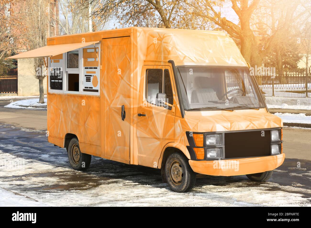 Fast food truck on city street Stock Photo - Alamy