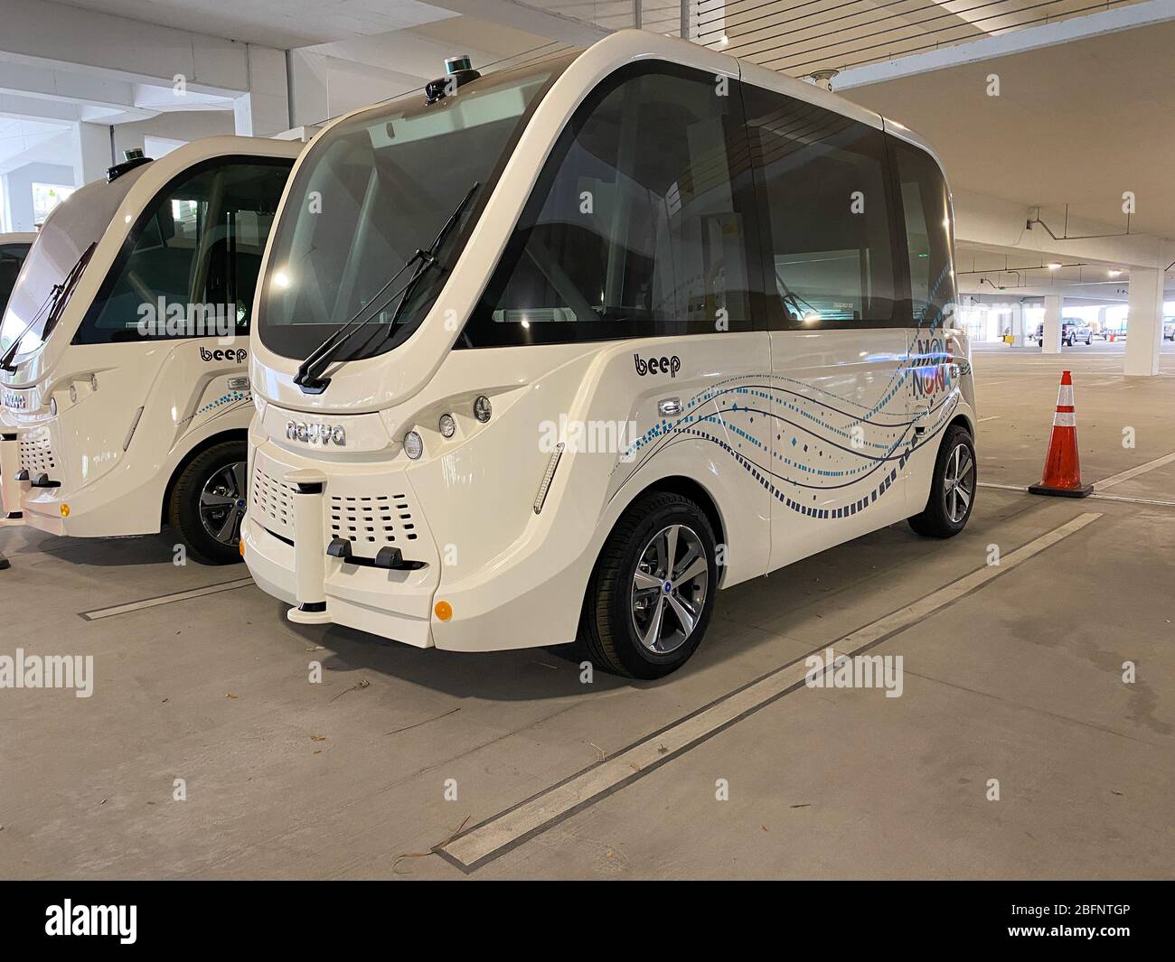 Orlando, FL/USA-4/10/20: Beep shuttles in a parking garage in Laureate ...