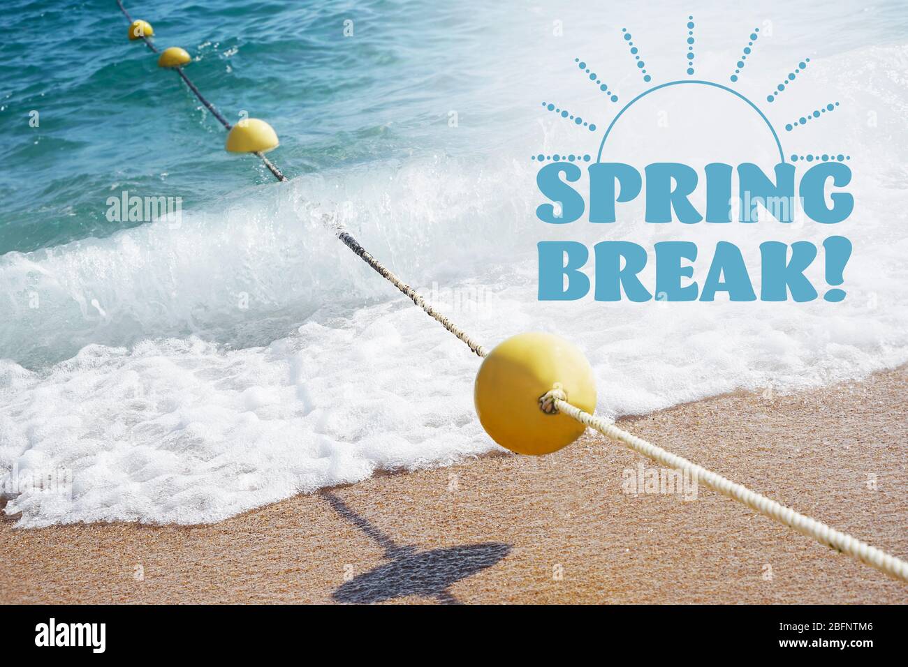 Spring break concept. Yellow buoy with rope on sand beach Stock Photo ...