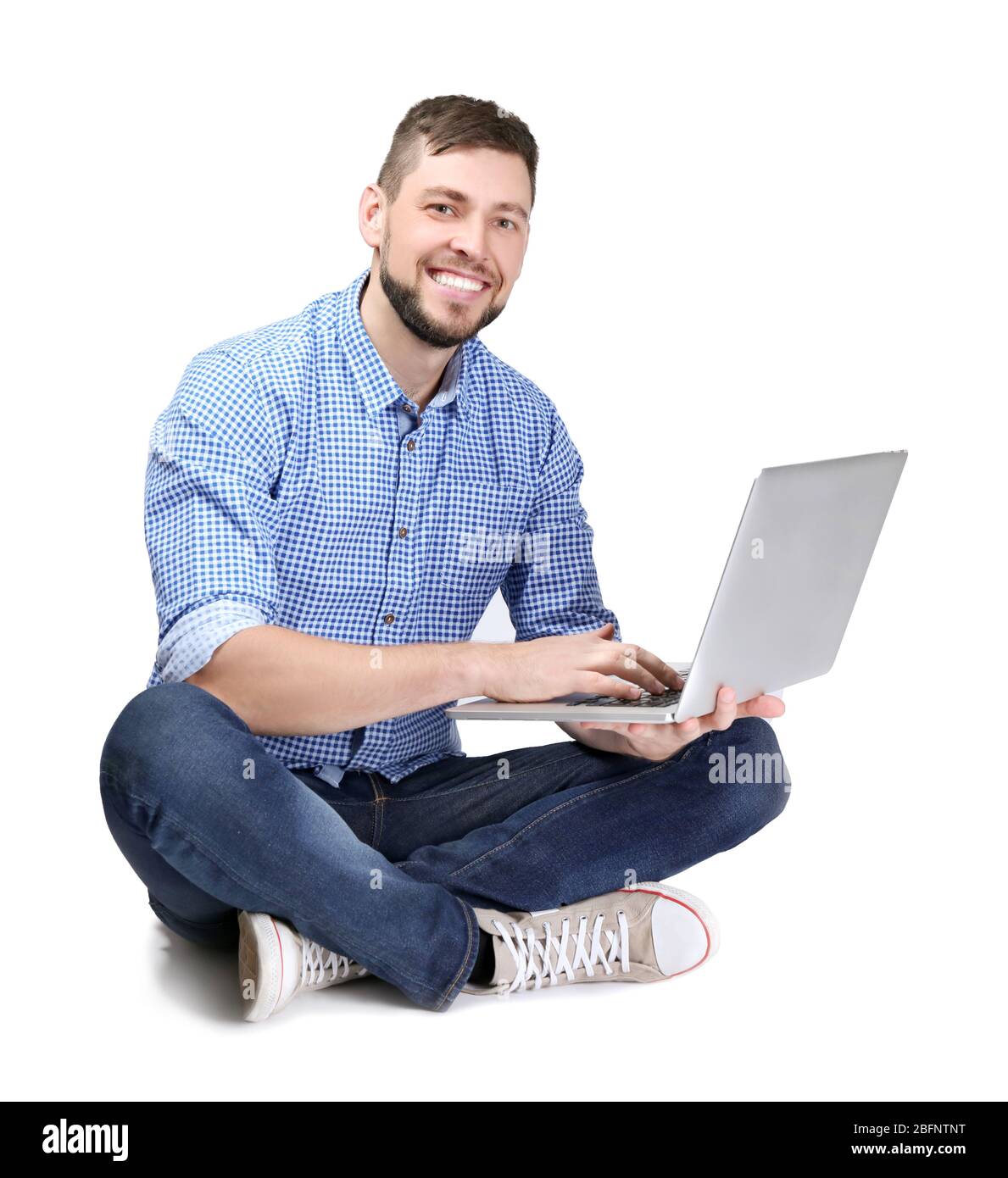 Handsome programmer with laptop on white background Stock Photo - Alamy