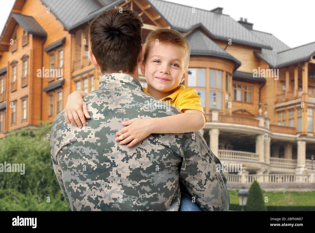 Happy soldier with son, outdoor Stock Photo - Alamy