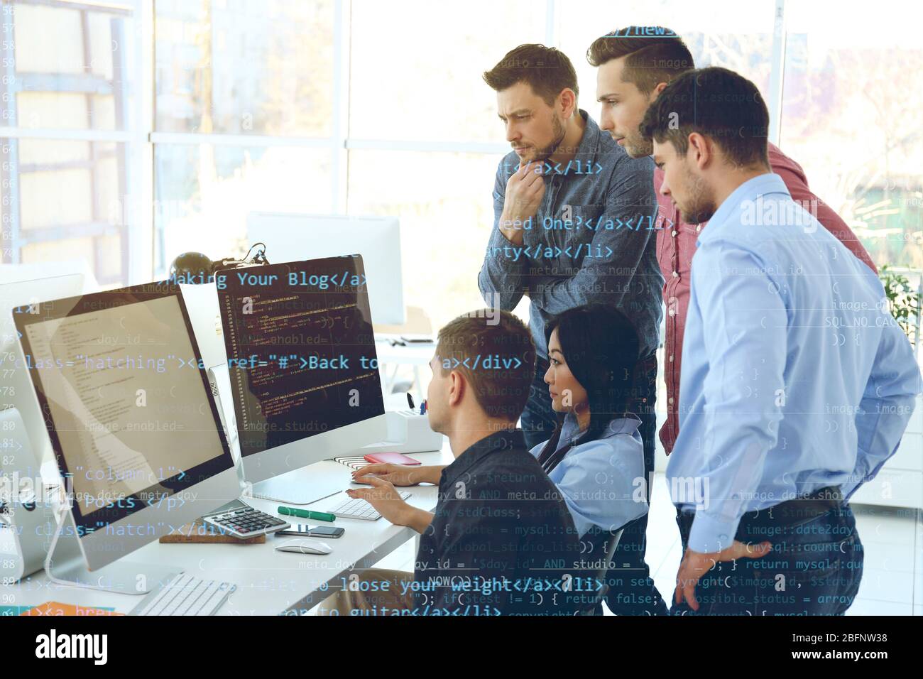Program development concept. Young people working in office Stock Photo ...