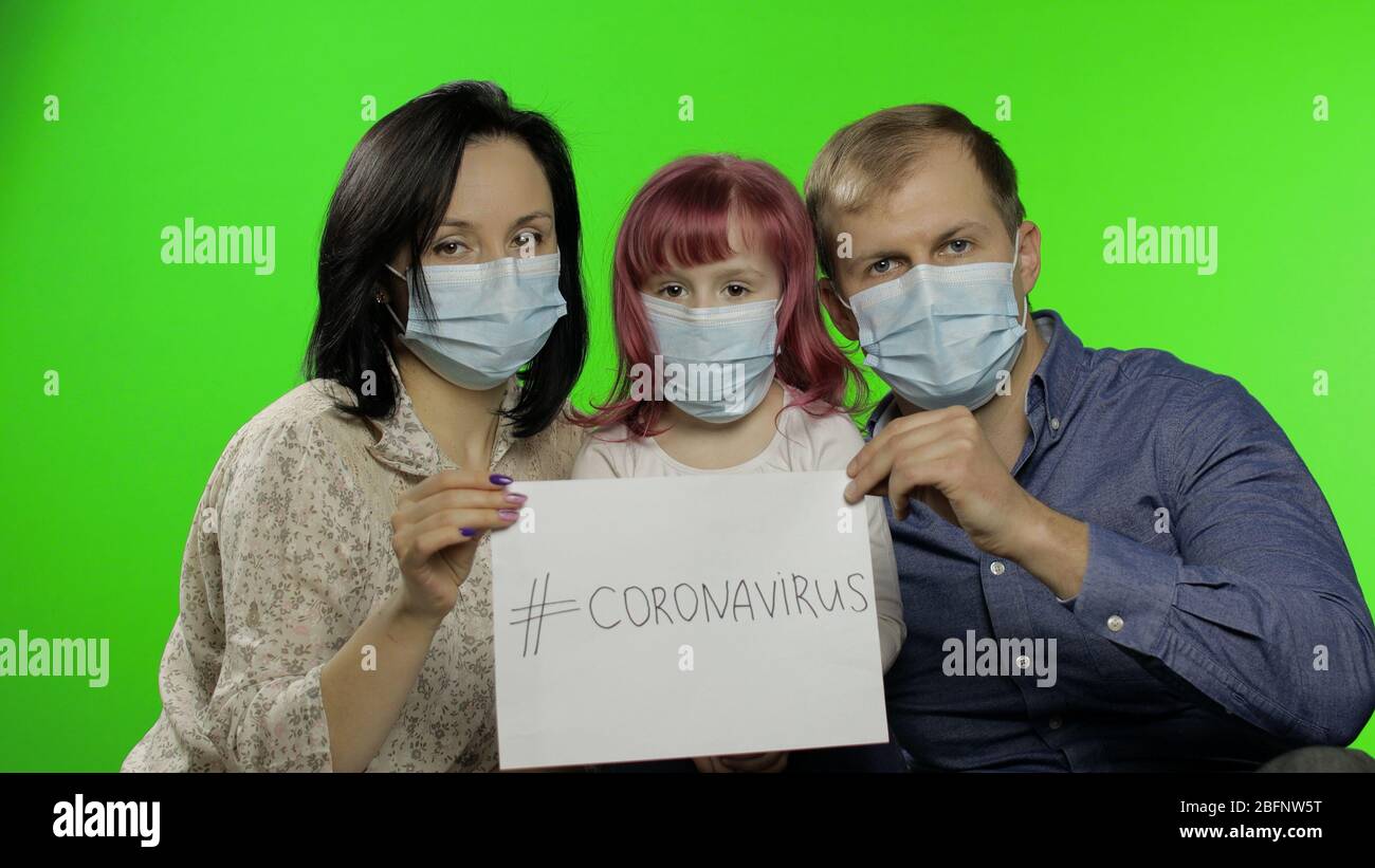 Sick family of three mother, father and child little daughter. Embrace ...