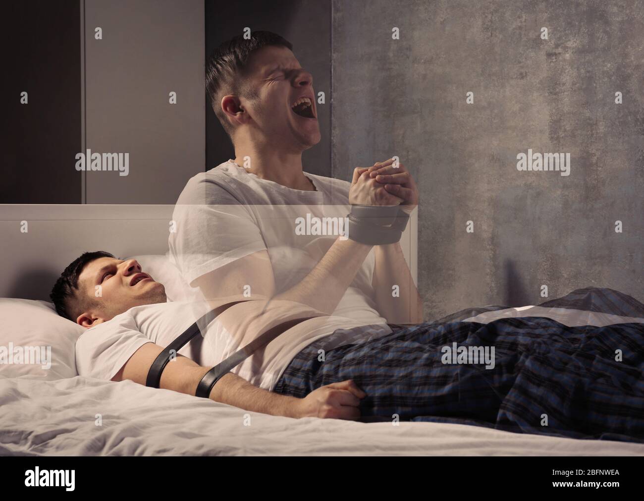 Man tied bed hi-res stock photography and images - Alamy