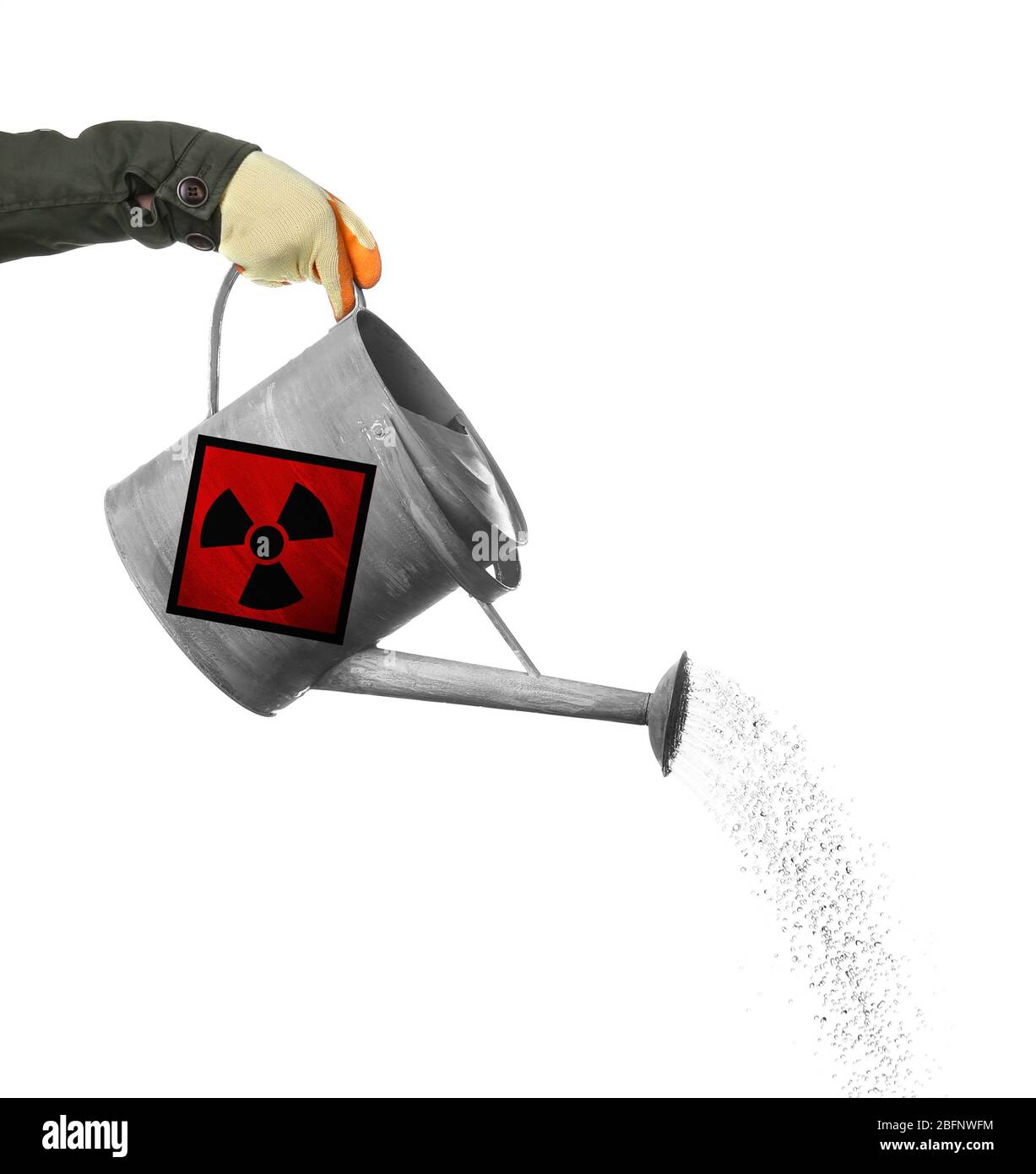 Environmental pollution concept. Hand pouring toxic water from can ...