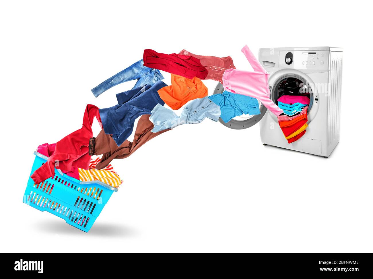 Washing machine and flying clothes on white background Stock Photo - Alamy