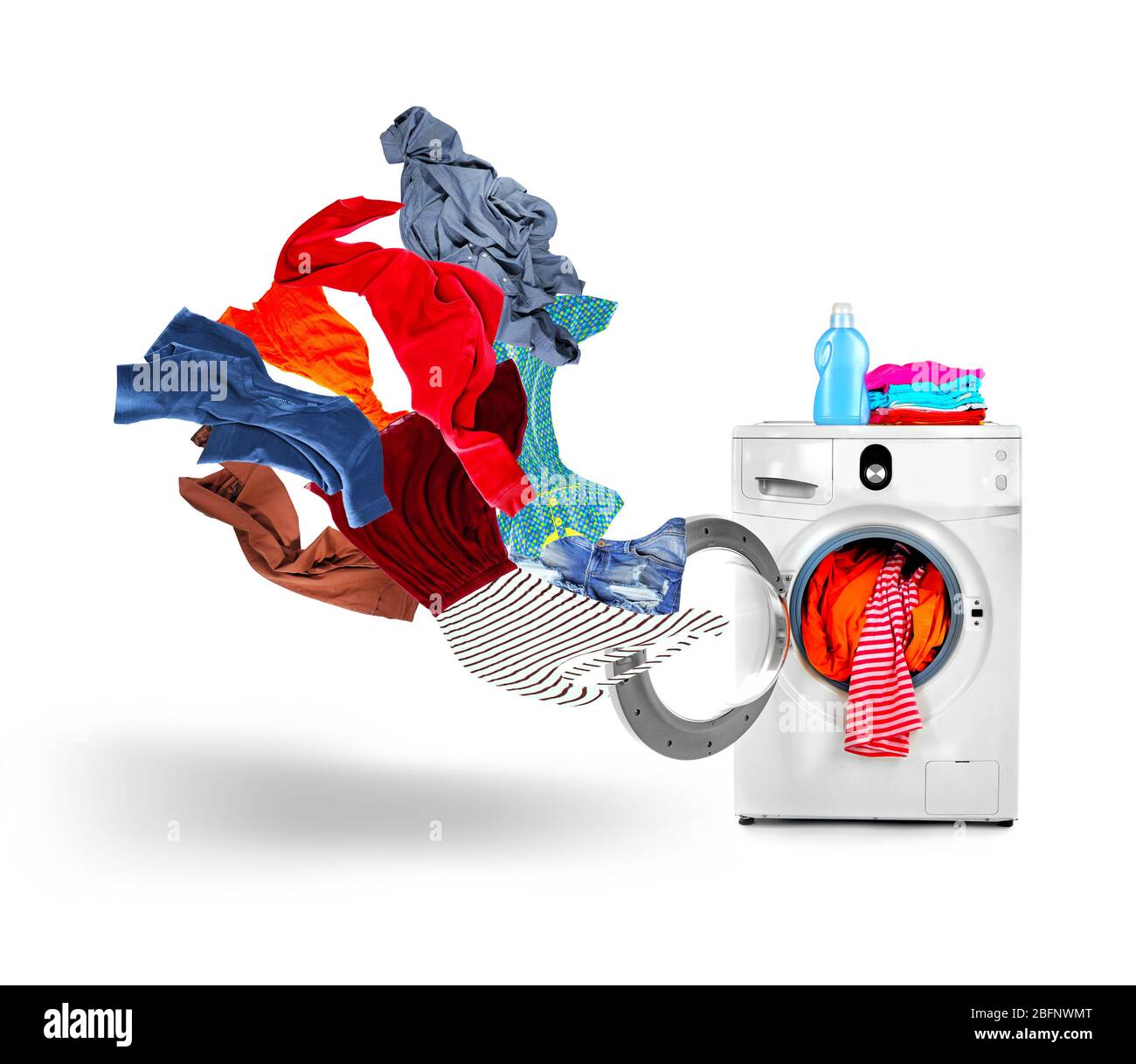 Washing machine and flying clothes on white background Stock Photo - Alamy