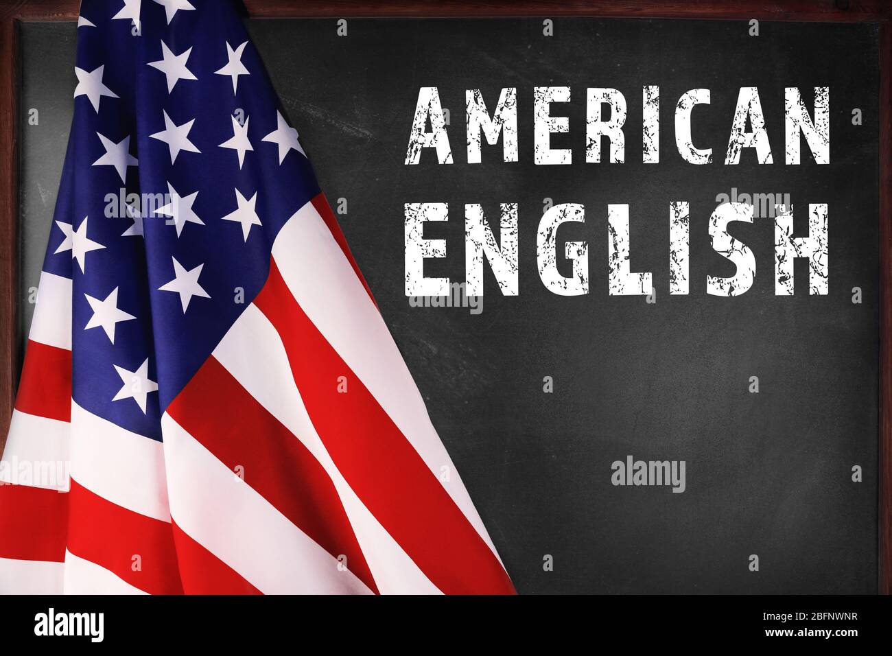 USA flag and text AMERICAN ENGLISH on blackboard background Stock Photo ...