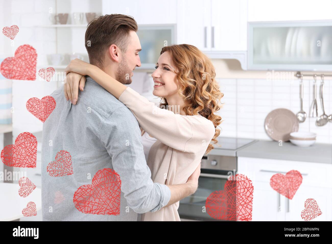 Young beautiful couple embracing hi-res stock photography and images ...