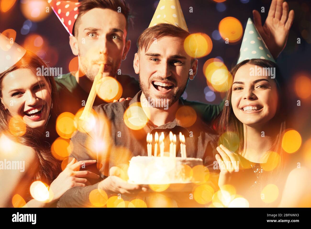 Young people having fun at birthday party in night club Stock Photo - Alamy