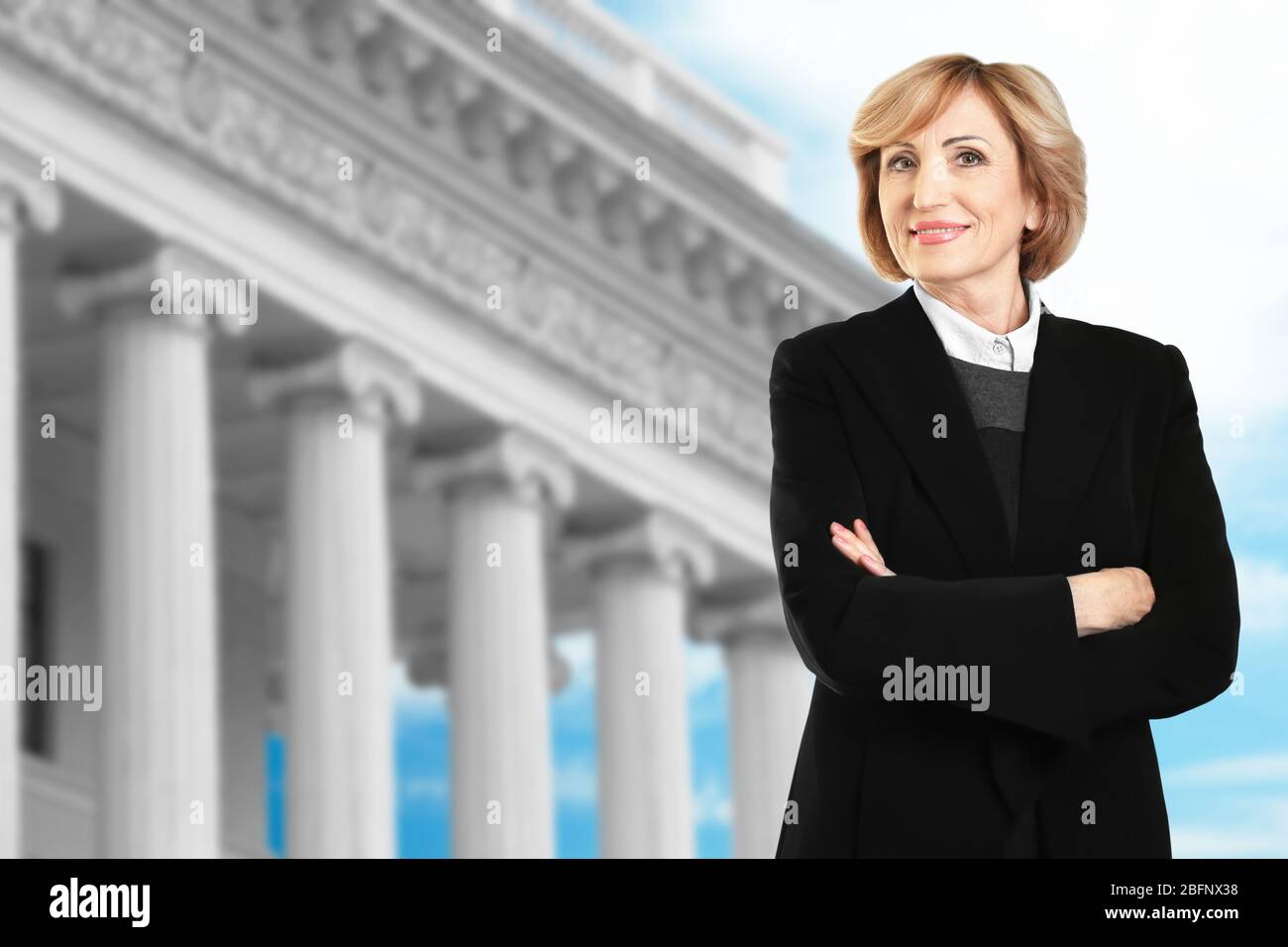 Law and justice concept. Senior woman on courthouse background Stock ...