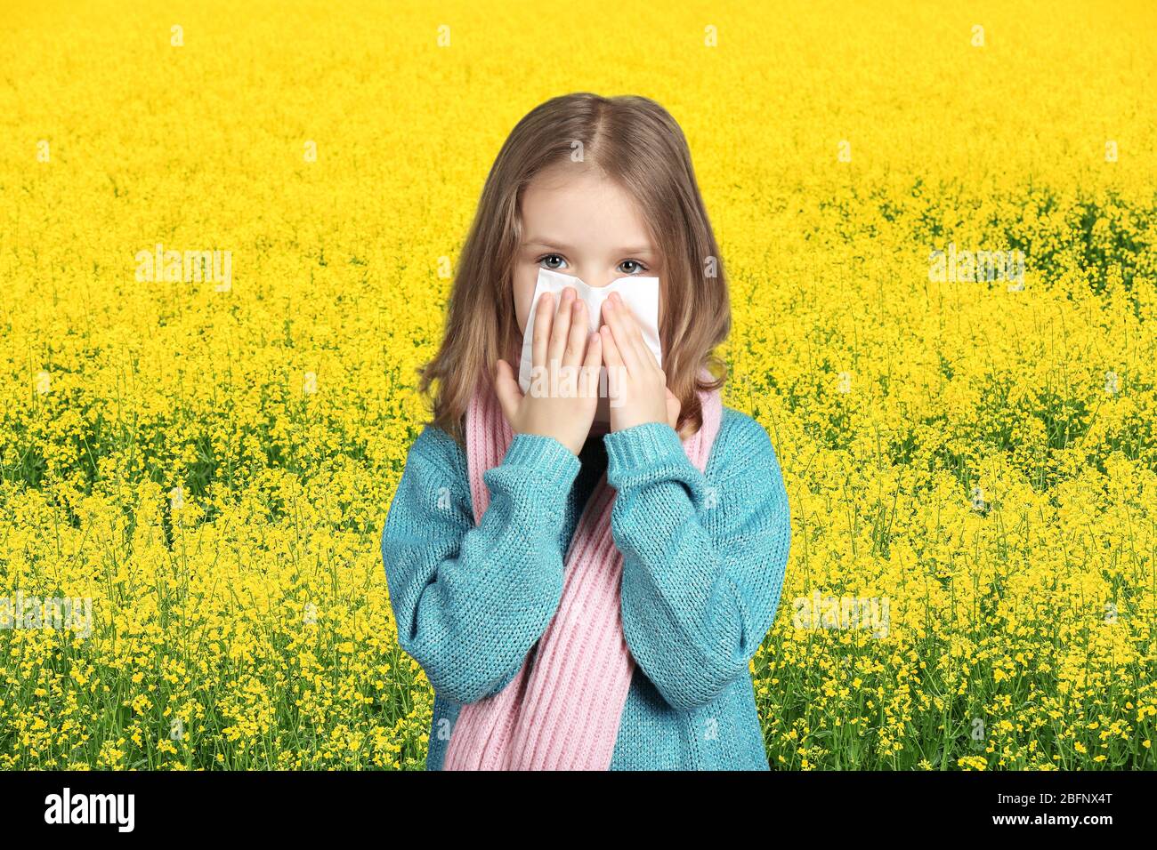 Seasonal allergy. Little girl with tissue outdoor Stock Photo - Alamy