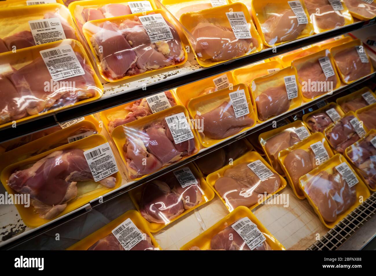 An attractive display of chicken in the butcher department of a ...