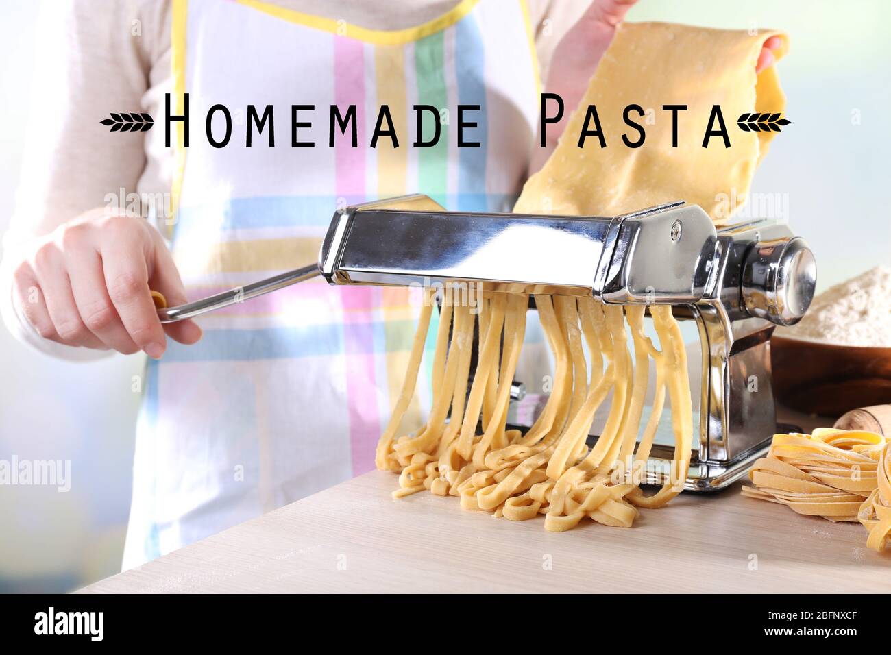 Tagliatelle manufacturing pasta machine hi-res stock photography and ...