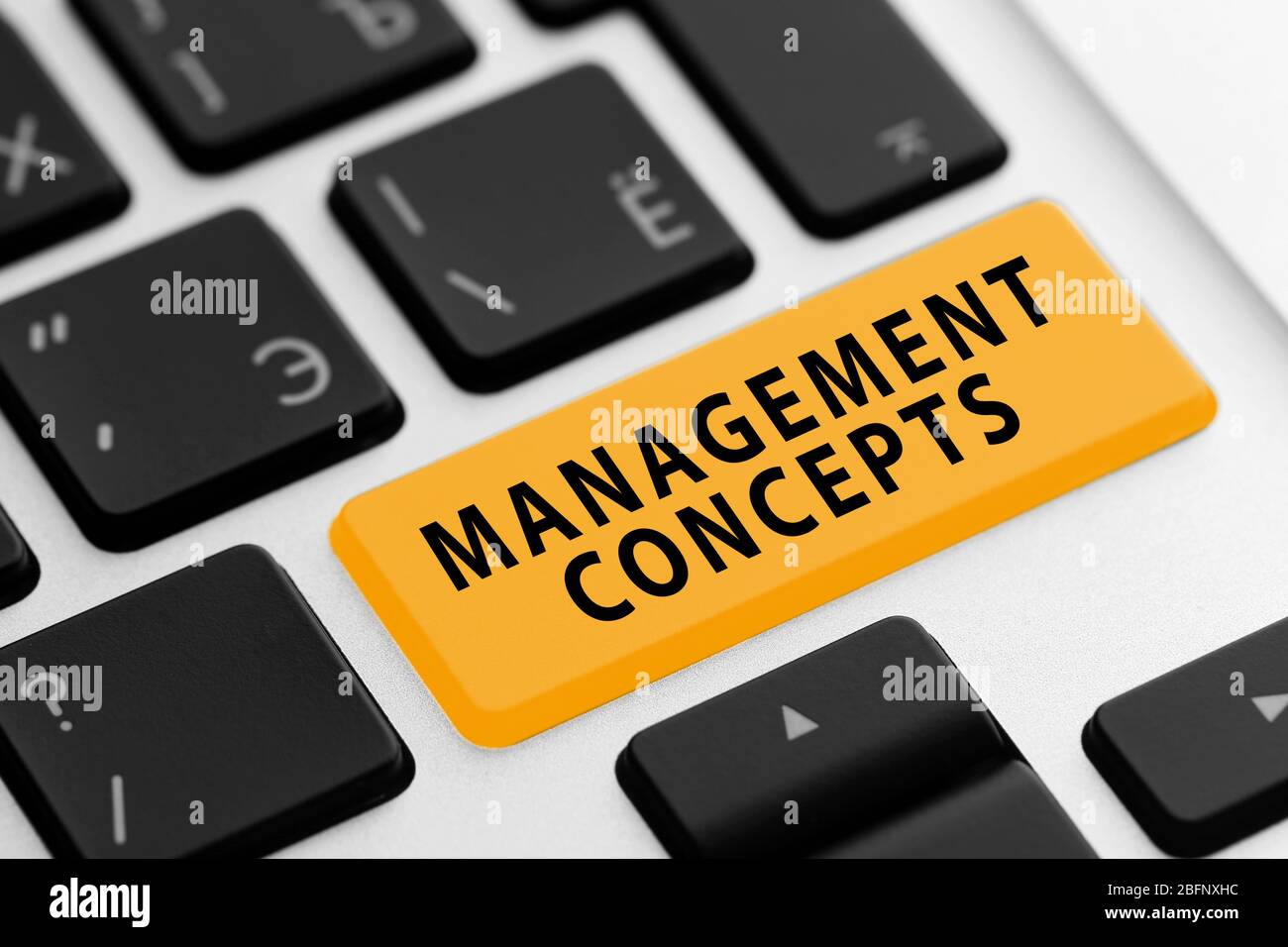 MANAGEMENT CONCEPTS button on keyboard, closeup Stock Photo - Alamy
