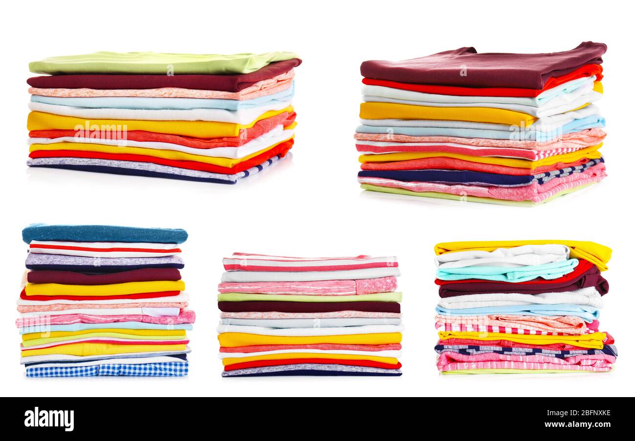 Stacks of folded clothes on white background Stock Photo - Alamy