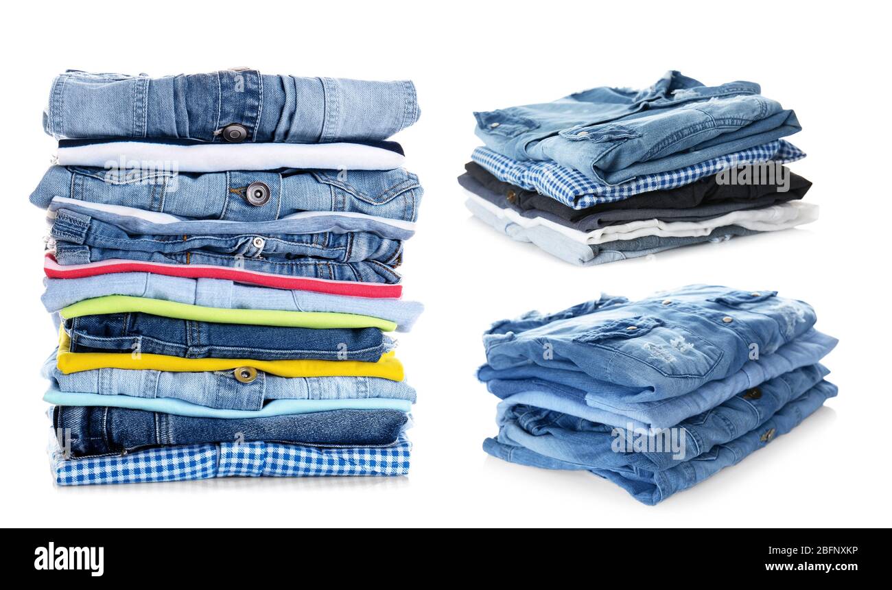 Stacks of folded clothes on white background Stock Photo - Alamy