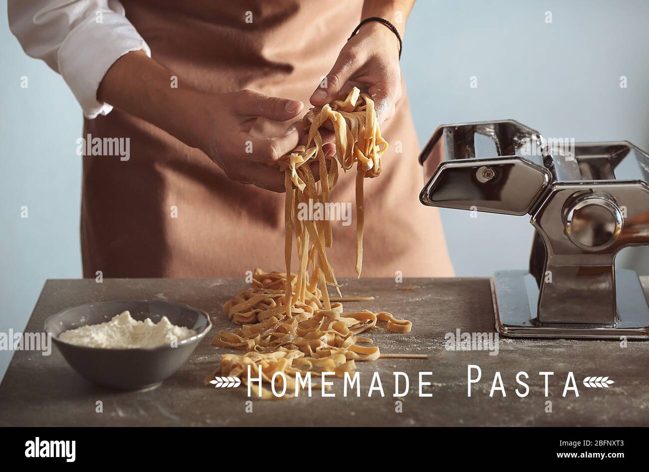 Tagliatelle manufacturing pasta machine hi-res stock photography and ...