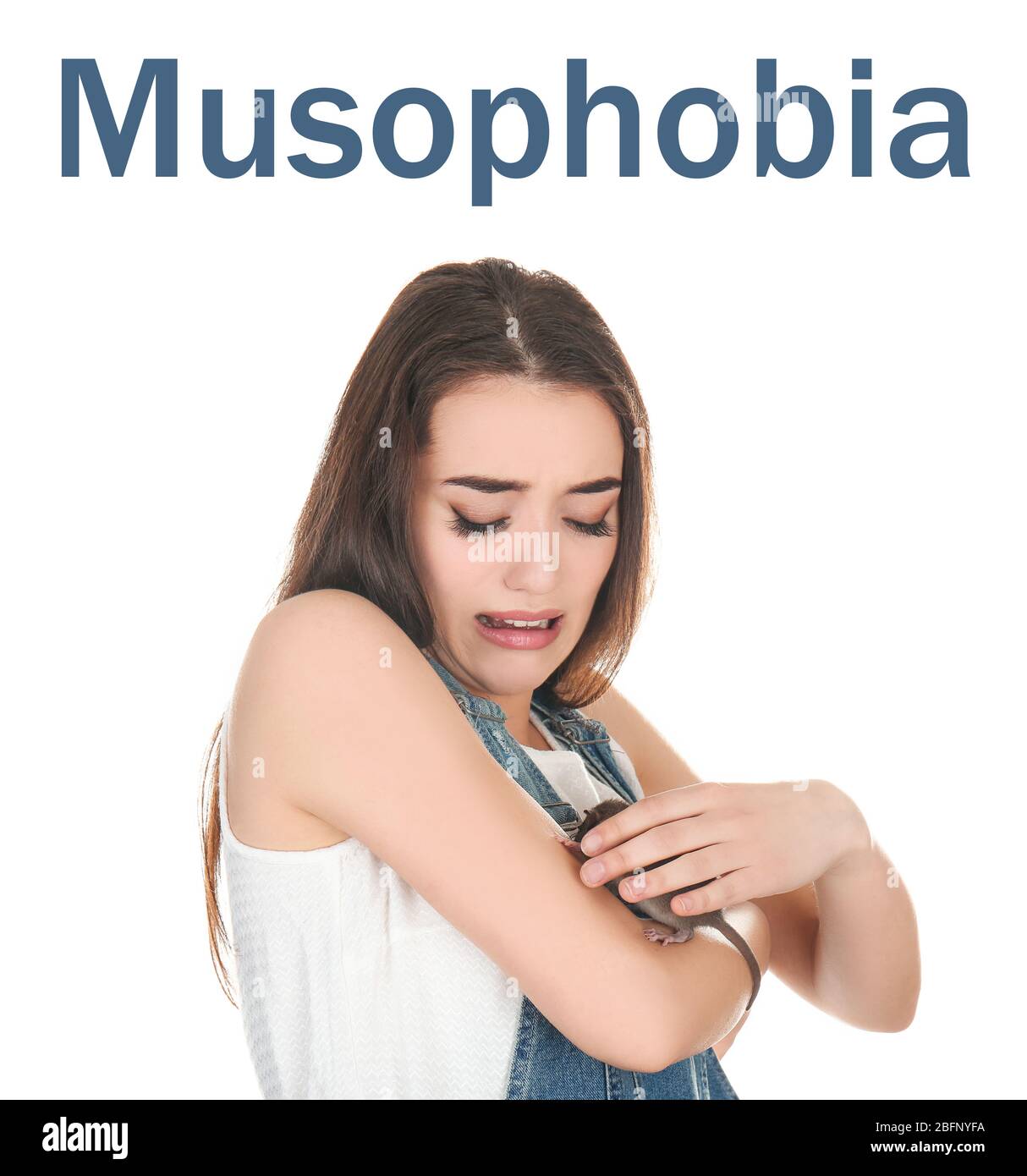 Terrified woman with mouse on white background. Musophobia concept ...