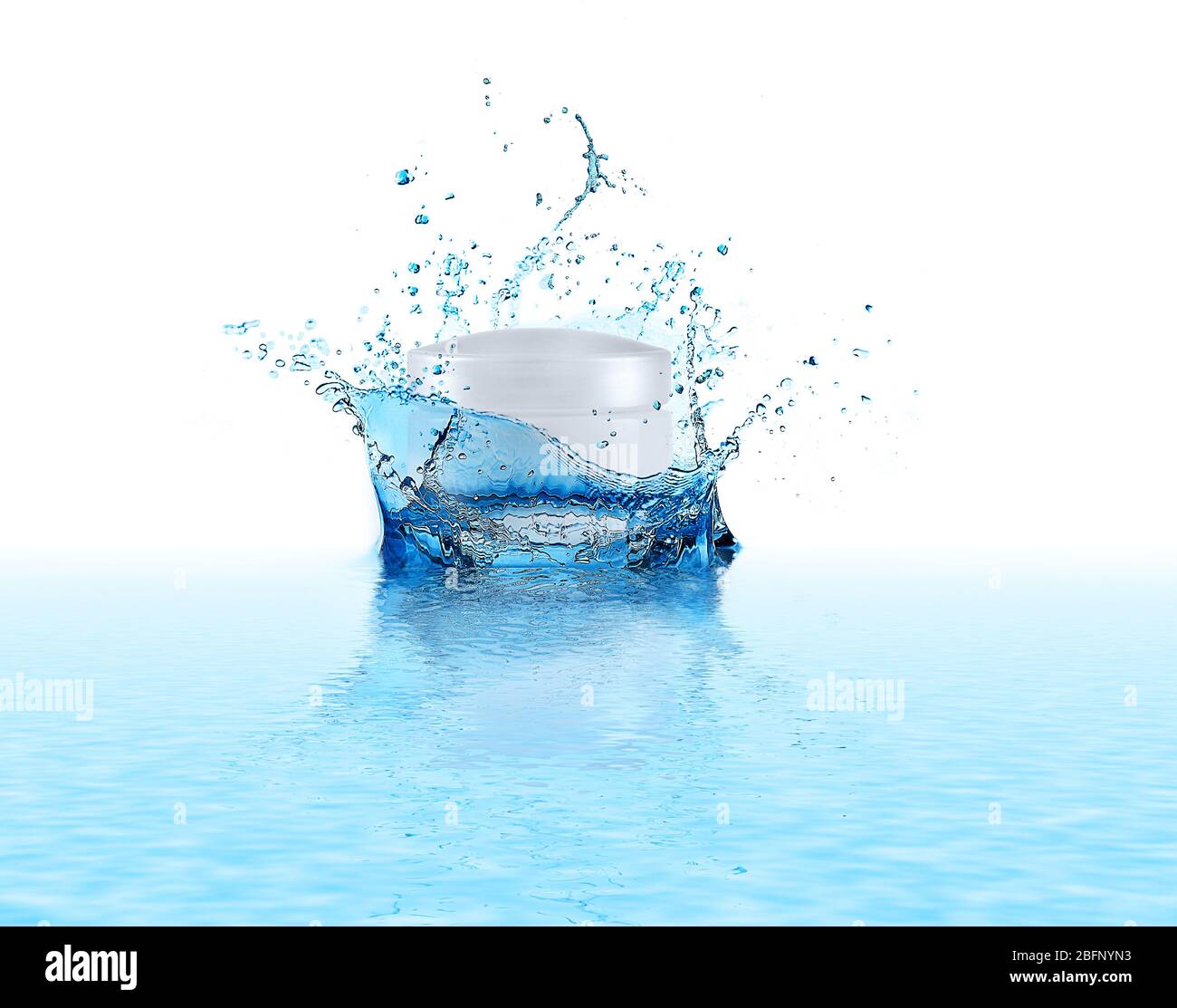 Cosmetic product and splashing water on white background. Beauty and ...