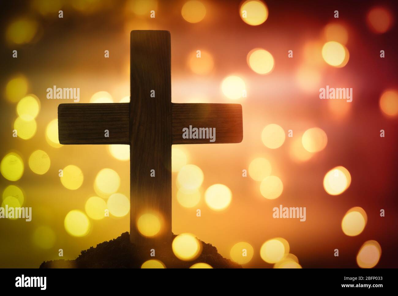 Wooden cross on blurred background. Christian religion Stock Photo - Alamy