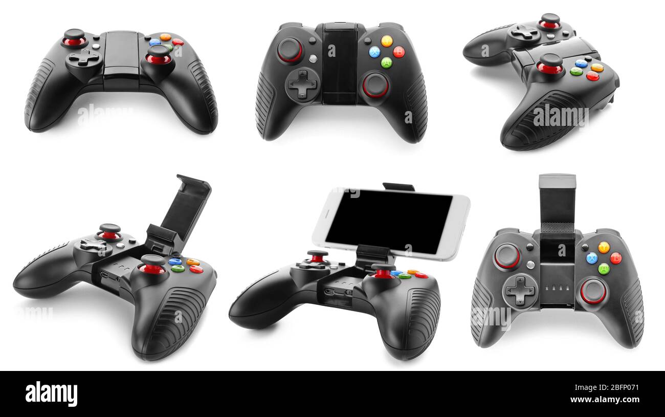 Set with video game controllers on white background Stock Photo - Alamy