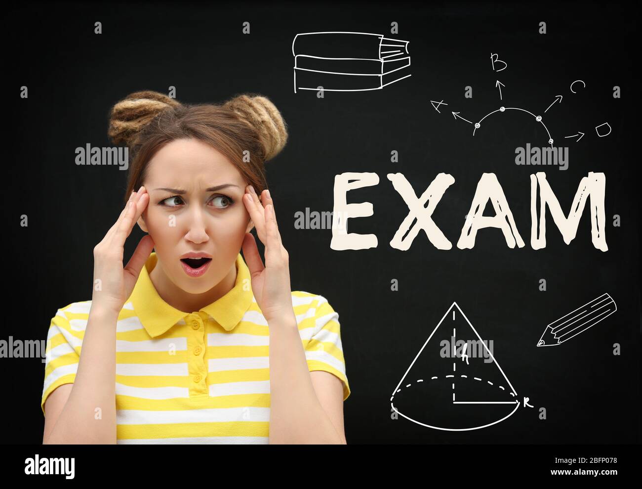Emotional student and word EXAM on dark background Stock Photo - Alamy
