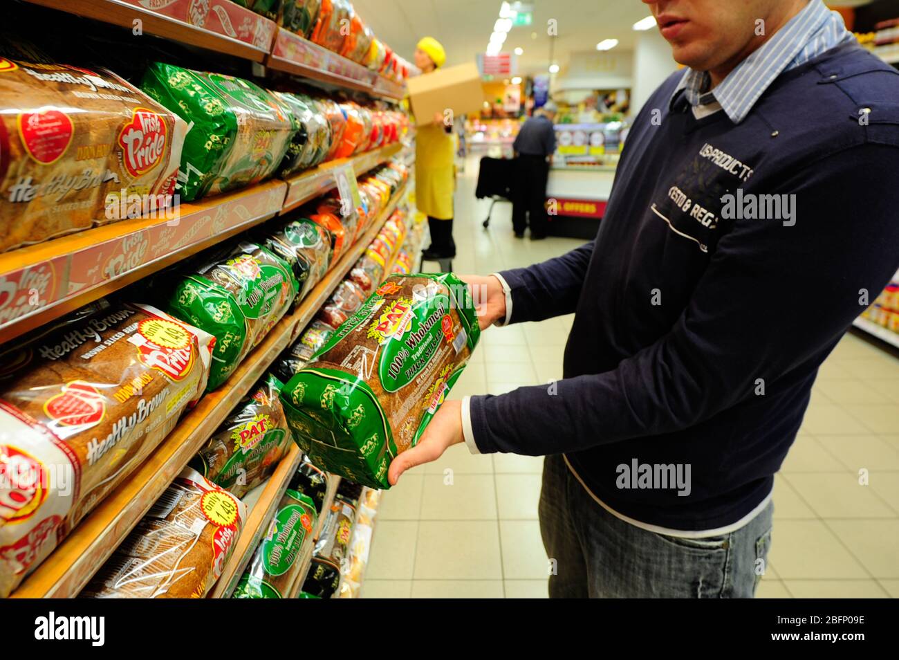 This photo shows a young man holding pat the baker bread (Newscast ...