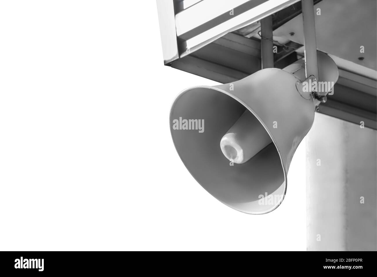 Megaphone on building against white background Stock Photo - Alamy