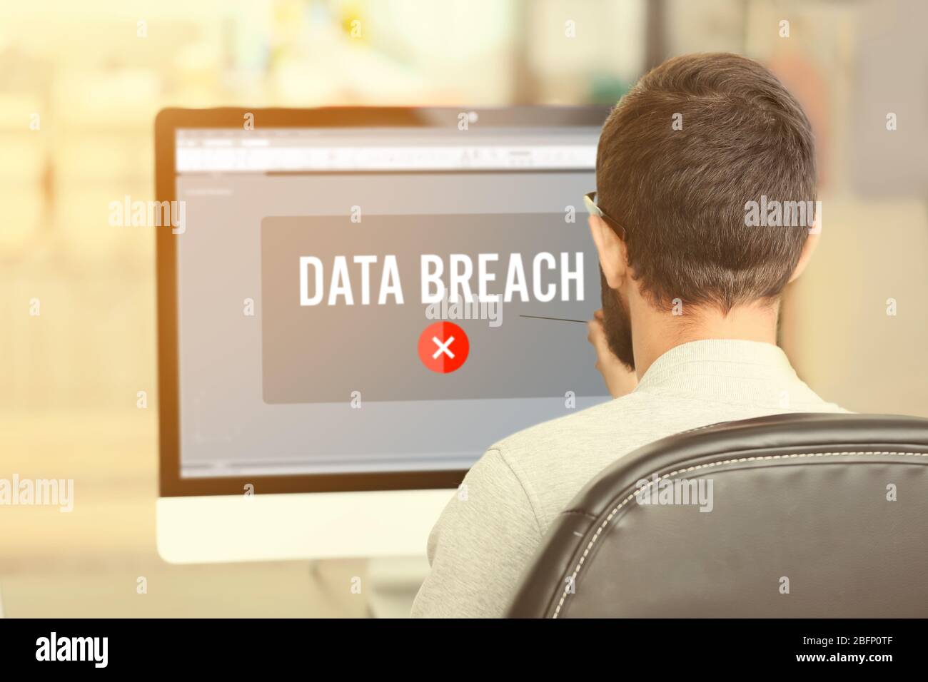 Man with computer and notification about threat of cyber attack on ...