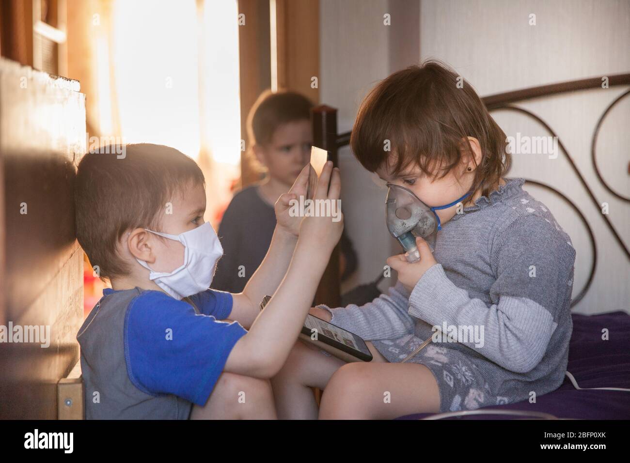 Covid-19. Pandemic and home isolation. Children and medical treatment ...