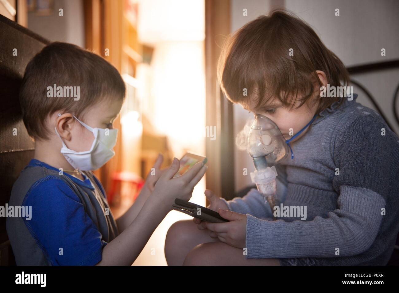 Covid-19. Pandemic and home isolation. Children and medical treatment ...