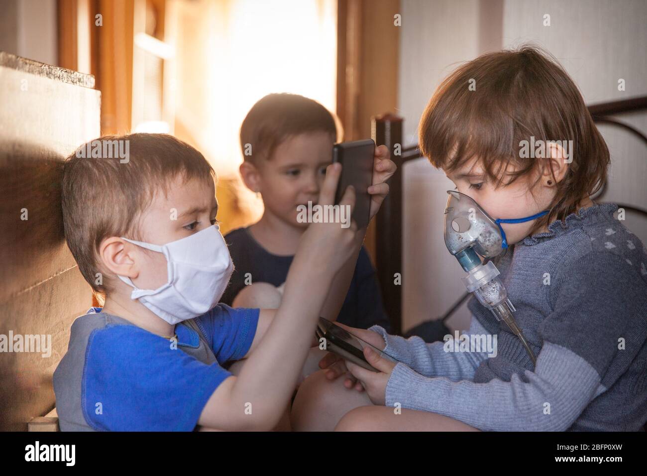 Covid-19. Pandemic and home isolation. Children and medical treatment ...