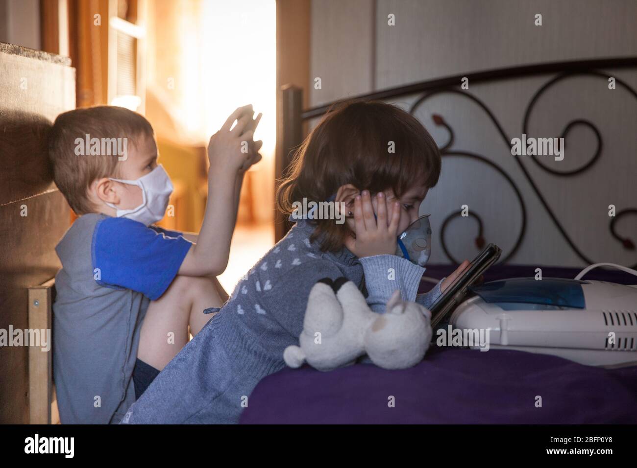 Covid-19. Pandemic and home isolation. Children and medical treatment ...