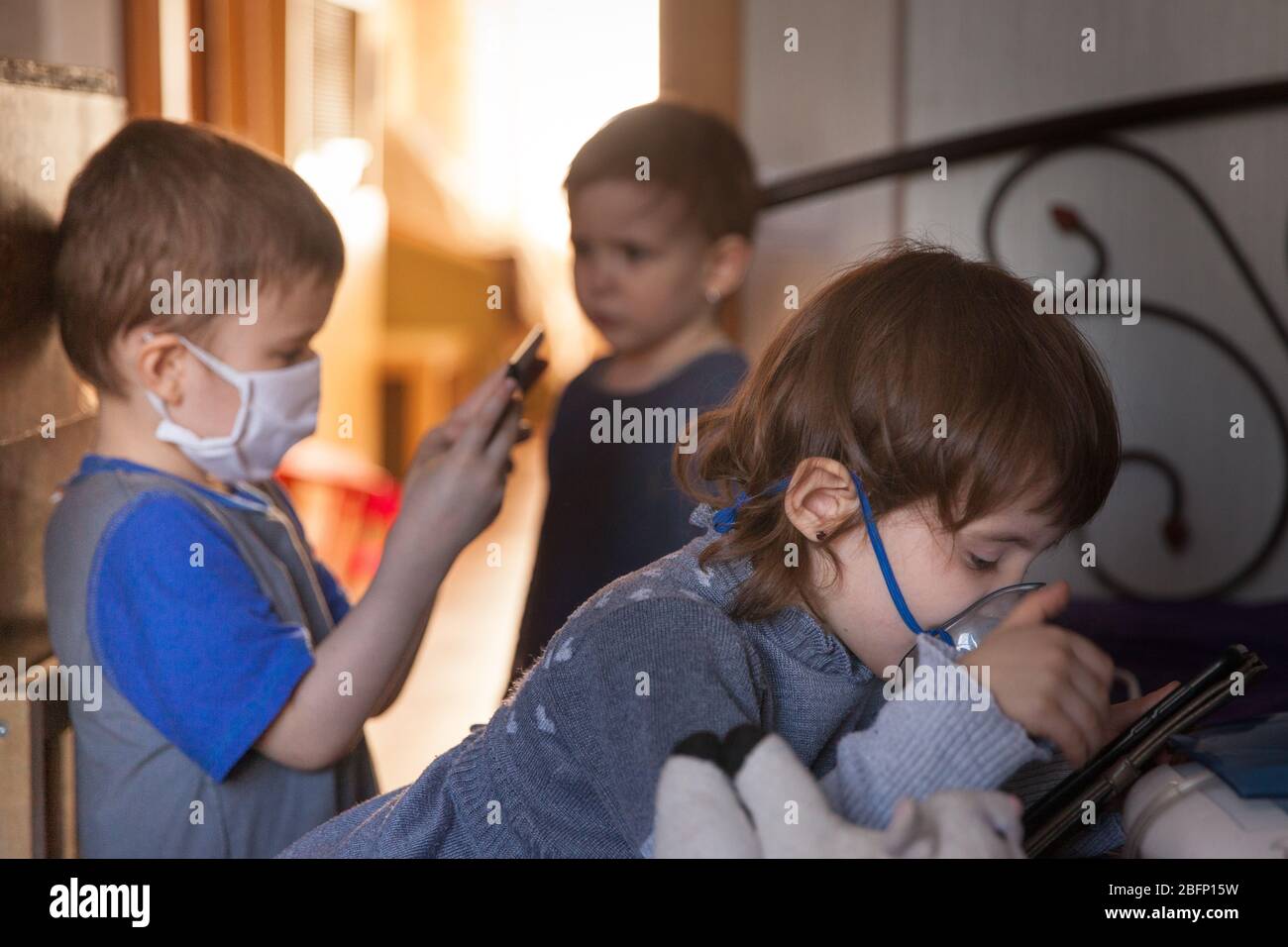 Covid-19. Pandemic and home isolation. Children and medical treatment ...