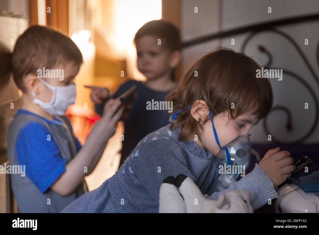 Covid-19. Pandemic and home isolation. Children and medical treatment ...