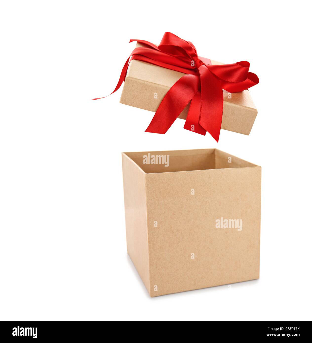 Open gift box on white background. Festive wrapping Stock Photo - Alamy