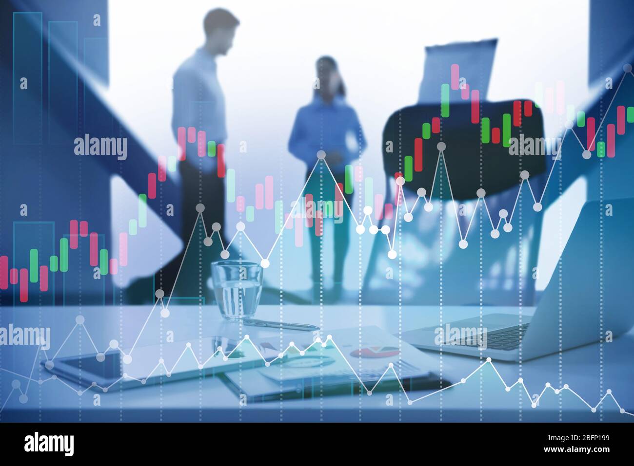 Graphs and broker's workplace on background. Financial trading concept ...
