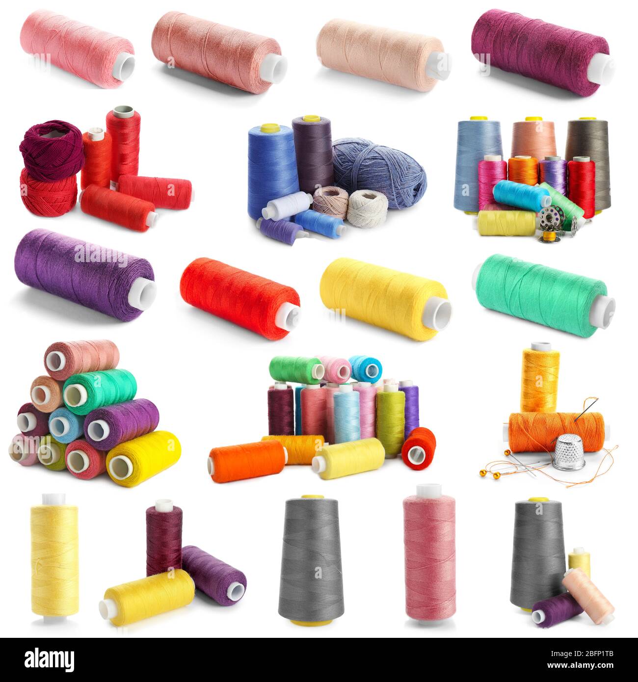 Set of different sewing threads on white background Stock Photo - Alamy