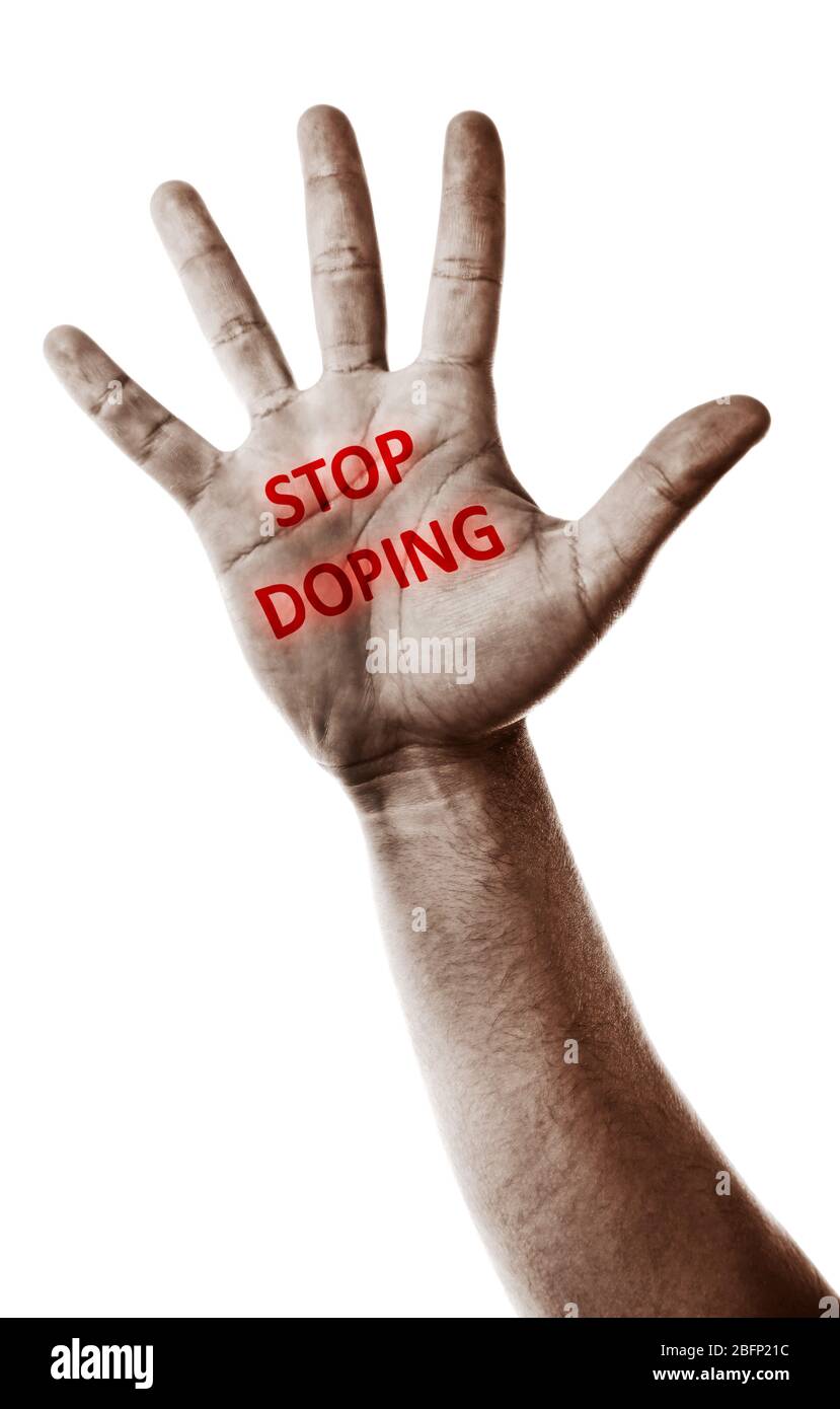 Stop doping concept. Male hand with text isolated on white Stock Photo ...